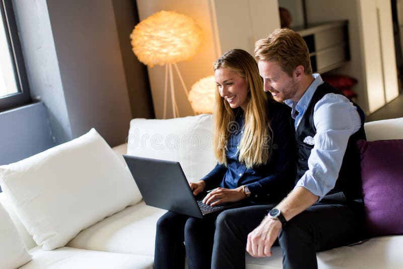 People on Sofa stock image. Image of relaxation, living - 18911085
