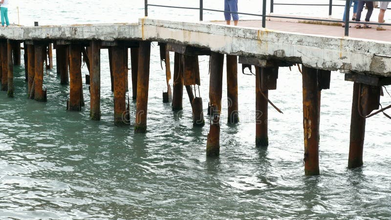 Rusty pier supports. stock video. Video of pier, wave - 130064153