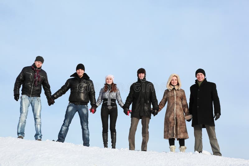People Stand on Snow and To Hold on To Hands Stock Image - Image of ...