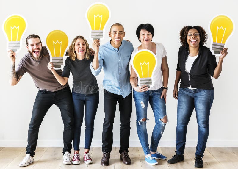 People Standing and Holding Lightbulb Icon Stock Image - Image of ...