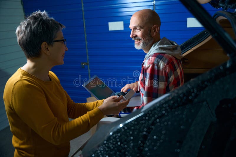 People Standing Near the Trunk of a Car Stock Photo - Image of ...