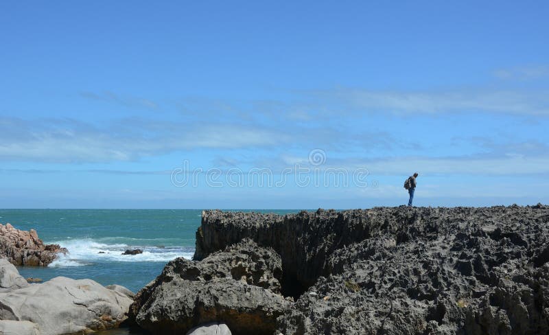 People Standing on the Rock on the Sea in Phan Rang, Vietnam Stock ...