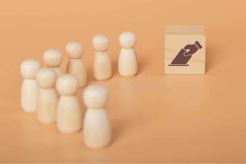 People Stood in a Queue, Patiently Waiting for Their Turn To ...