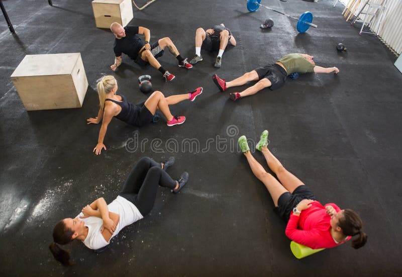 People Stretching in Cross Training Box Stock Photo - Image of angle ...
