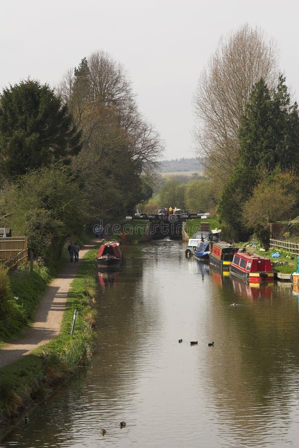 People Strolling Along River Stock Photo - Image of peaceful, calm: 746998