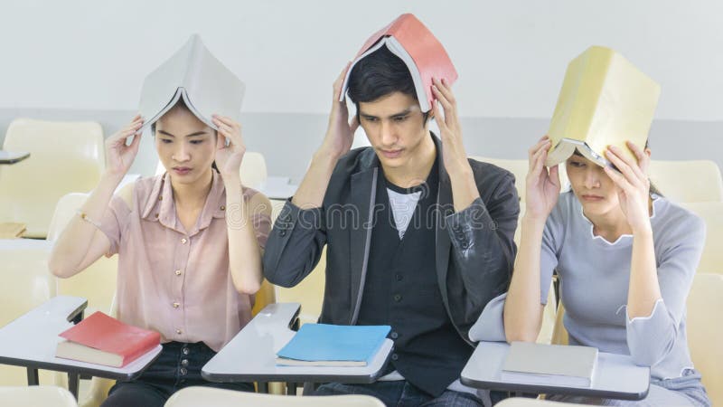 People Student Read Book and Hold Over Head and Sit Lecture Chairs ...