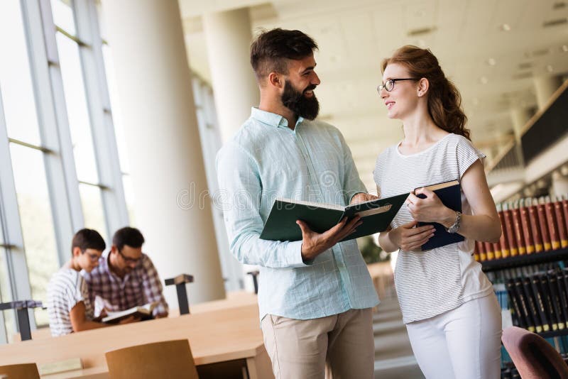 People Studying Together in a Modern Library Stock Image - Image of ...