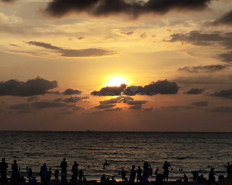 People and sunset stock image. Image of afterglow, coast - 227595039