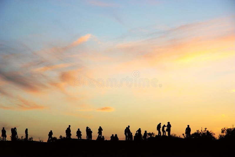 People and sunset clouds stock image. Image of hill, person - 16509317