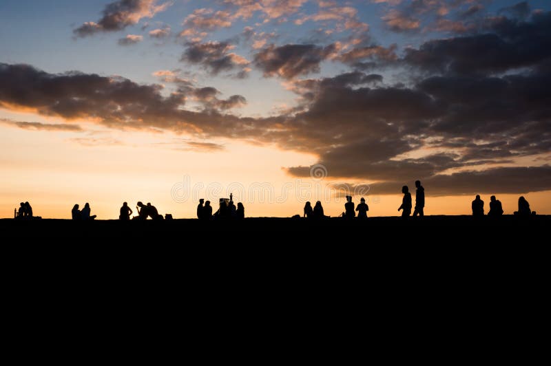 People at sunset stock image. Image of sitting, dusk - 32436907
