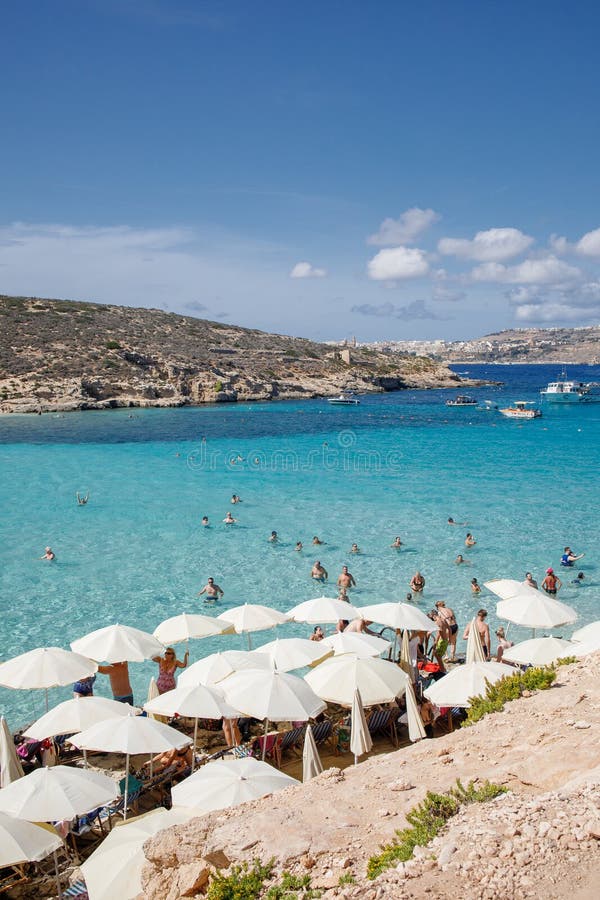 People Swimming on the Blue Lagoon Beach on Malta Stock Photo - Image ...