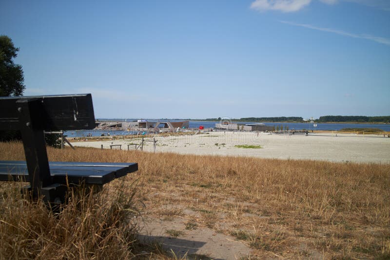 People Swimming in the Pier by the Sand Stock Image - Image of running ...