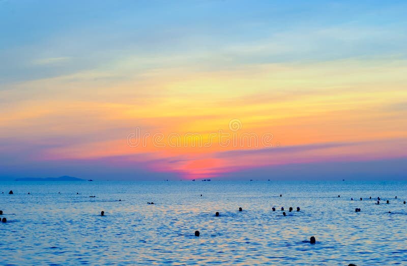 People Swimming On Sea During Golden Hour Picture. Image: 117112387