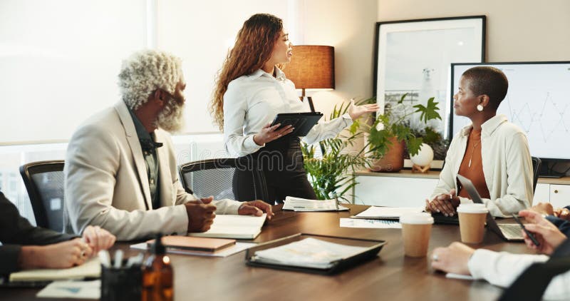 People, Tablet and Meeting in Office for Presentation, Feedback or ...