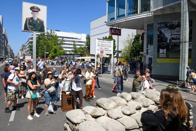 People Taking Photos at the Checkpoint Charlie on Berlin in Germany ...