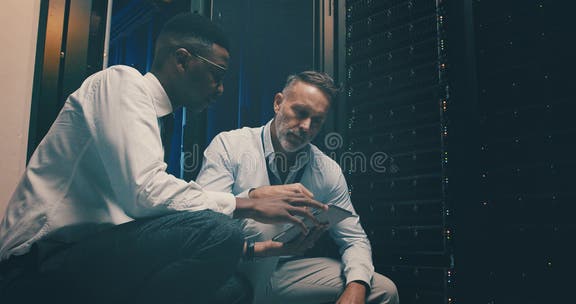 People, Talk and Network with Tablet in Server Room for Programming, Software Update and ...