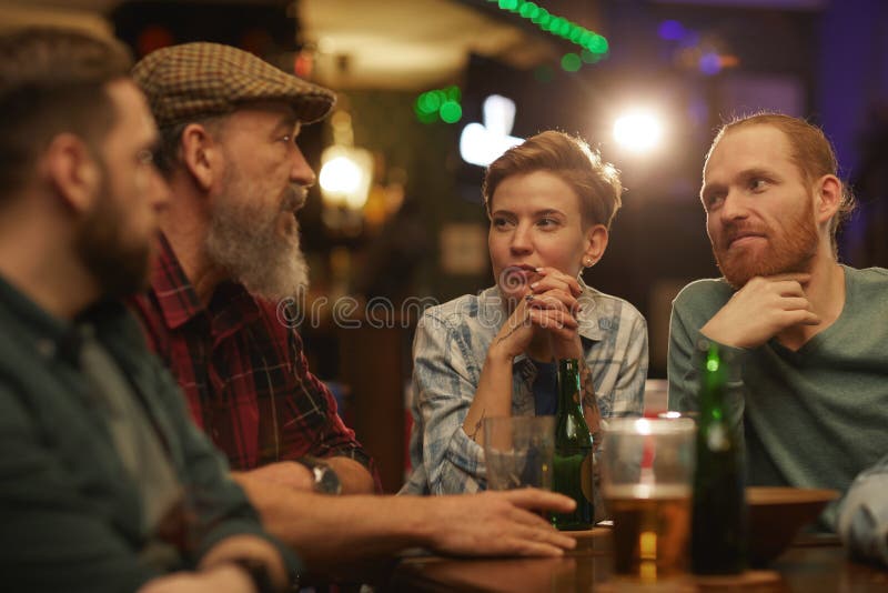 People talking in the pub stock image. Image of happiness - 177014927