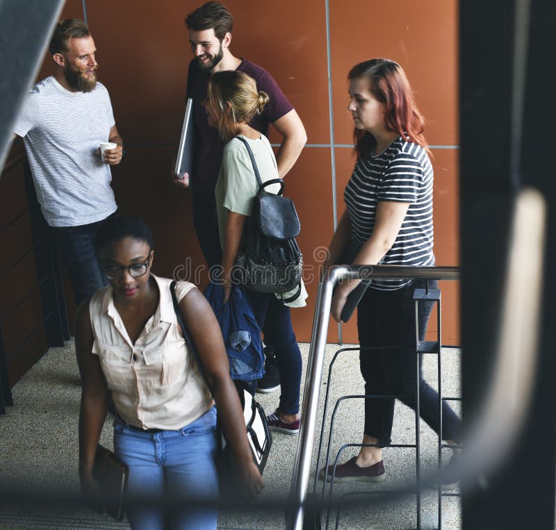 People Talking at Stairway on Break Time Stock Image - Image of small ...