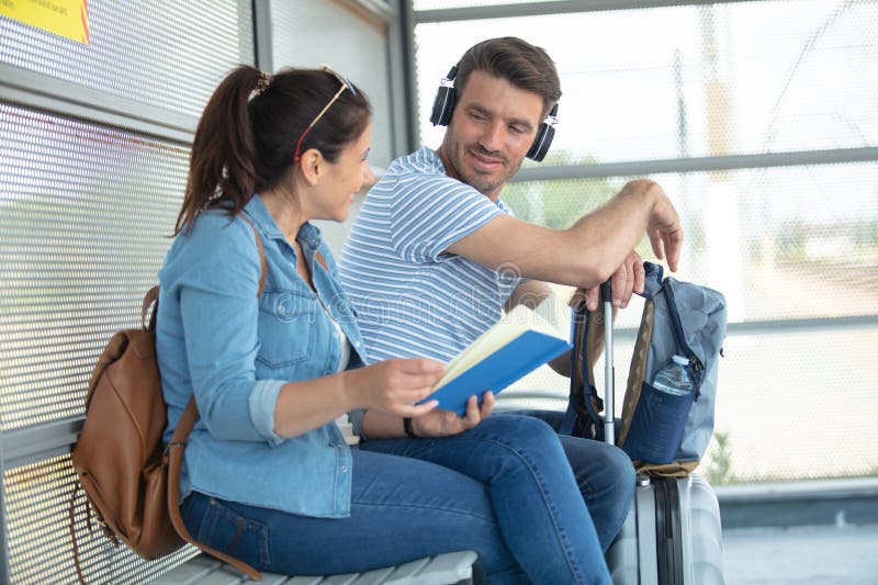People Talking in Train Station Stock Photo - Image of talking ...