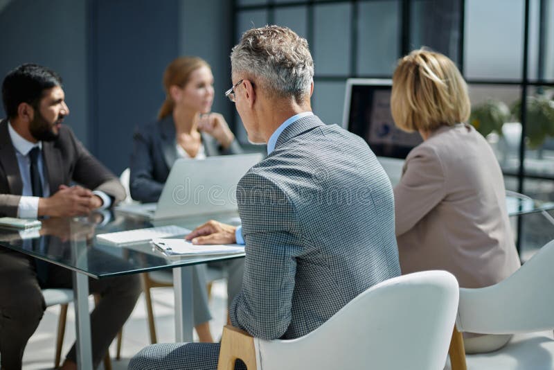 People Talking and Working in the Office Stock Image - Image of ...
