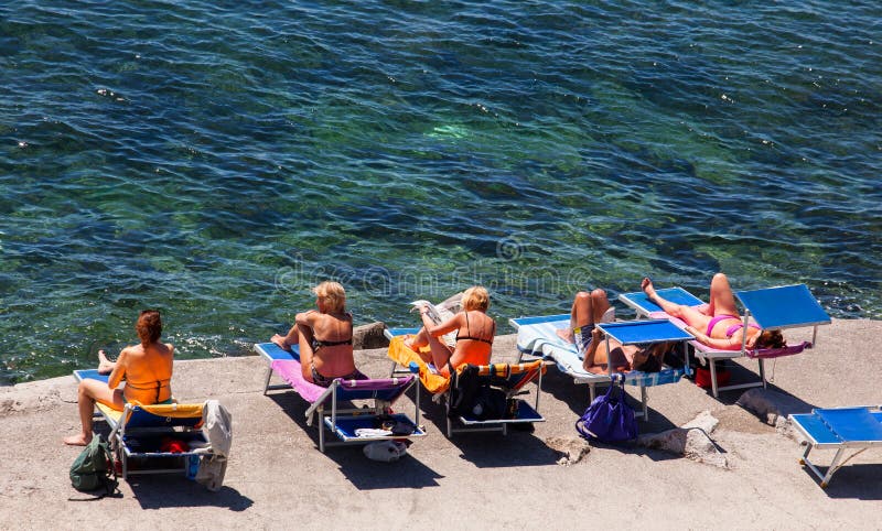 People Tanning Under Umbrellas on the Beach at Sharm El Sheikh Beach ...