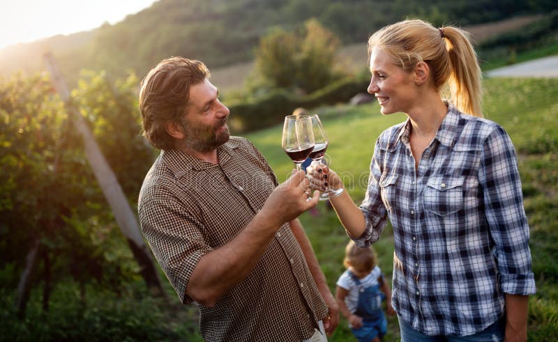 People Tasting Wine in Vineyard Stock Photo - Image of nature, portrait ...