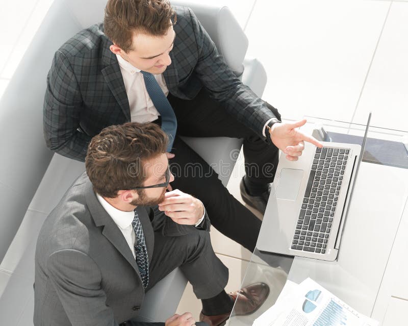 Employees Working with a Laptop Stock Image - Image of businesspeople ...