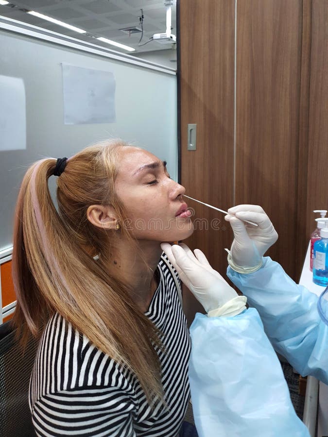 People Testing for COVID-19 Testing by the Antigen Test Kit Method ...