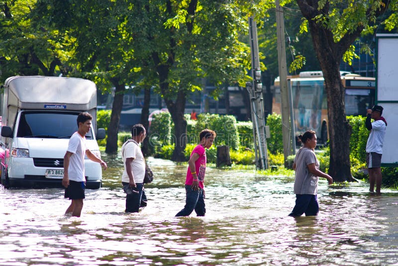 People To Walk through Flooded Road Editorial Stock Photo - Image of ...