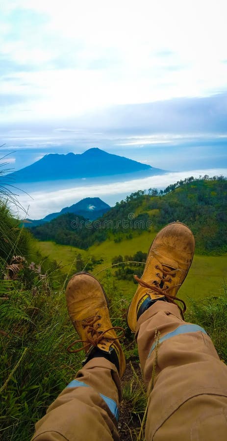 People on the Top of the Mountain Enjoying the Natural Scenery Stock ...