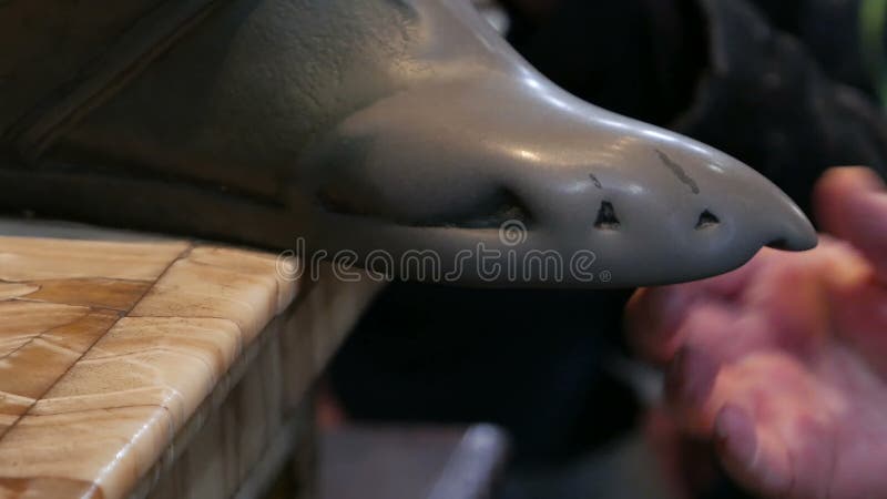 People touching statue leg stock footage. Video of city - 47569792