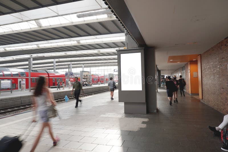 People Train Station Walk Against Backdrop White Billboard Along ...