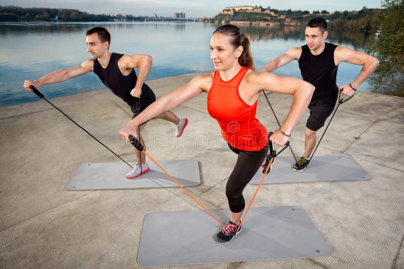 People Training with Resistance Band Stock Photo - Image of girl, band ...