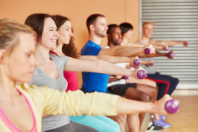 People Training with Weights Stock Image - Image of effort, center ...