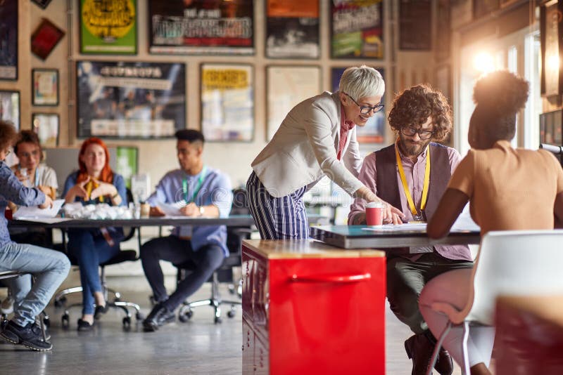 People in Two Groups Working Together in Open Space Office Stock Photo ...