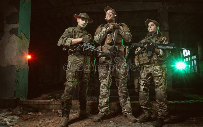 The People in Uniform with Weapons in the Ruins Stock Image - Image of ...