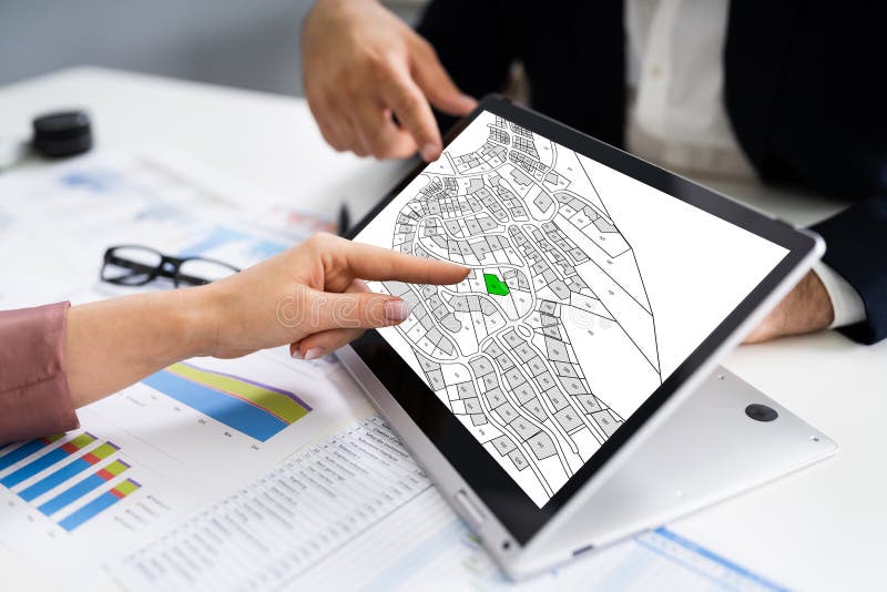 People Using Cadastral Survey Map Stock Photo - Image of city, female ...