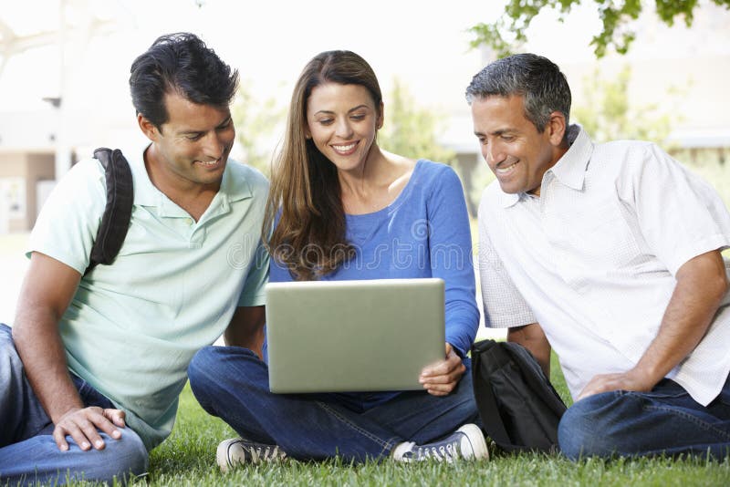 People Using Laptop Outdoors Stock Image - Image of happy, forties ...