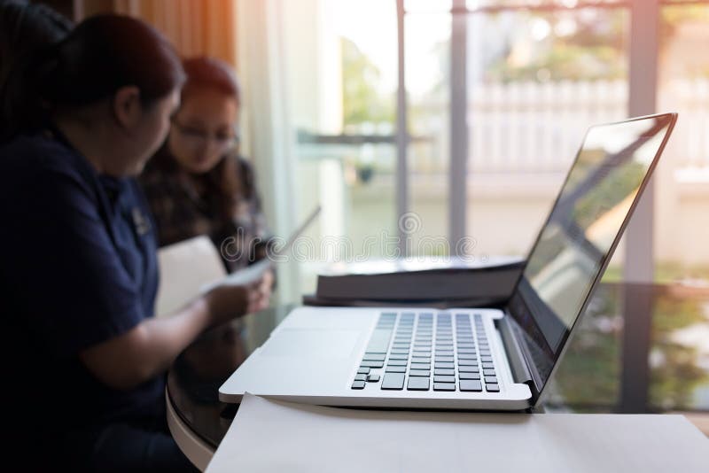 People Using Laptop Working in Living Room Home Stock Photo - Image of ...