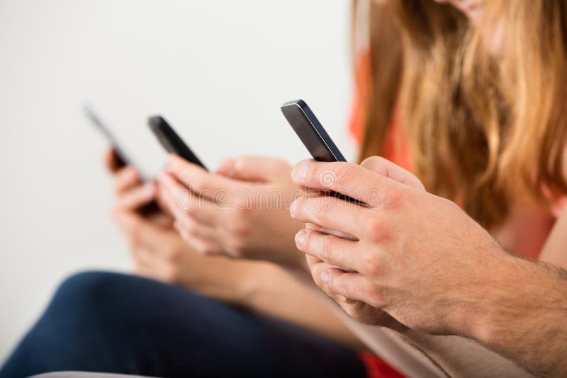 People Using Mobile Phone stock image. Image of family - 88097503