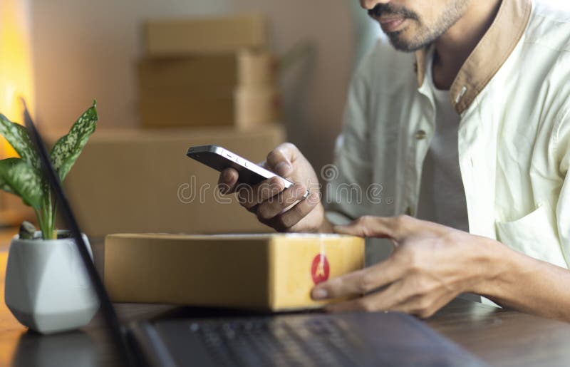 People Using Mobile Phone at Workplace and Preparing Order Store for ...