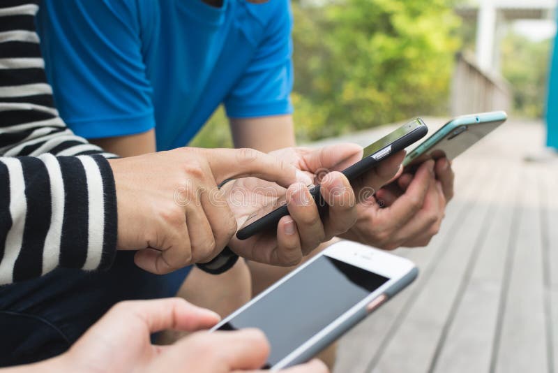 People using smartphone stock image. Image of cell, outdoor - 71843763