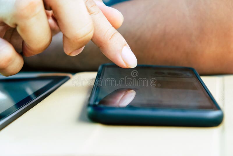 People using a smartphone. stock photo. Image of device - 159506882