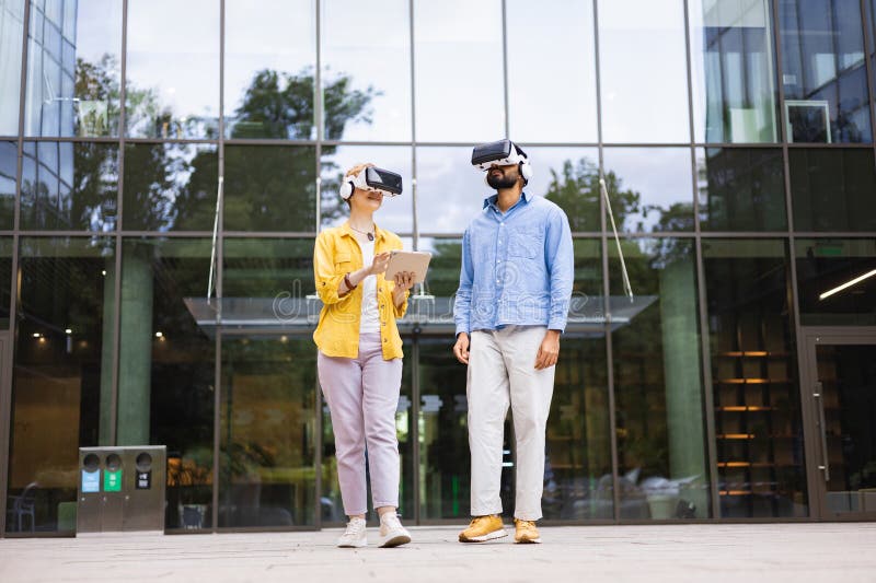 People Using VR Headsets Outdoors Stock Photo - Image of city, tablet ...
