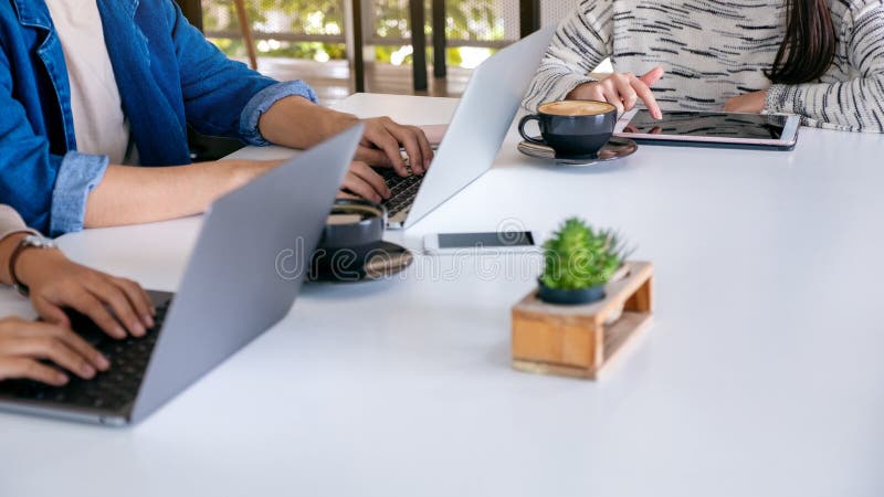 People Using and Working on Laptop Computer and Tablet Pc in Office ...