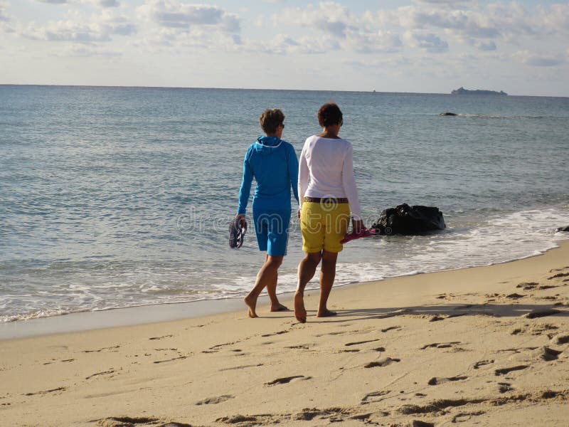 People on Vacation and at Work on the Beach by the Sea Editorial Photo ...