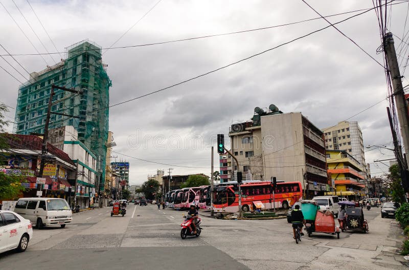 People and Vehicles on Street in Manila, Philippines Editorial ...