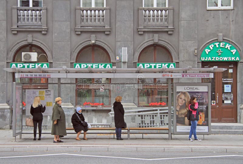 People are Waiting for Bus at Stop in Warsaw, Poland Editorial ...