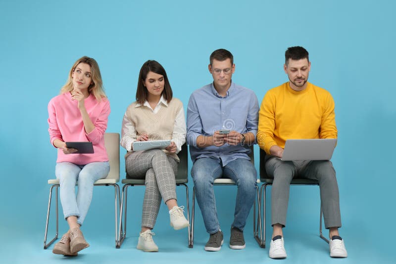 People Waiting for Job Interview on Light Blue Background Stock Image ...