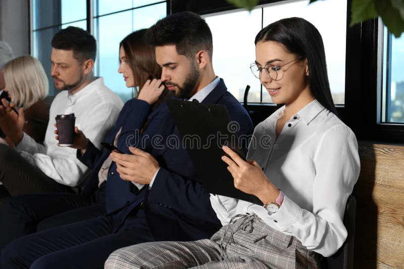 People Waiting for Job Interview in Office Stock Image - Image of human ...